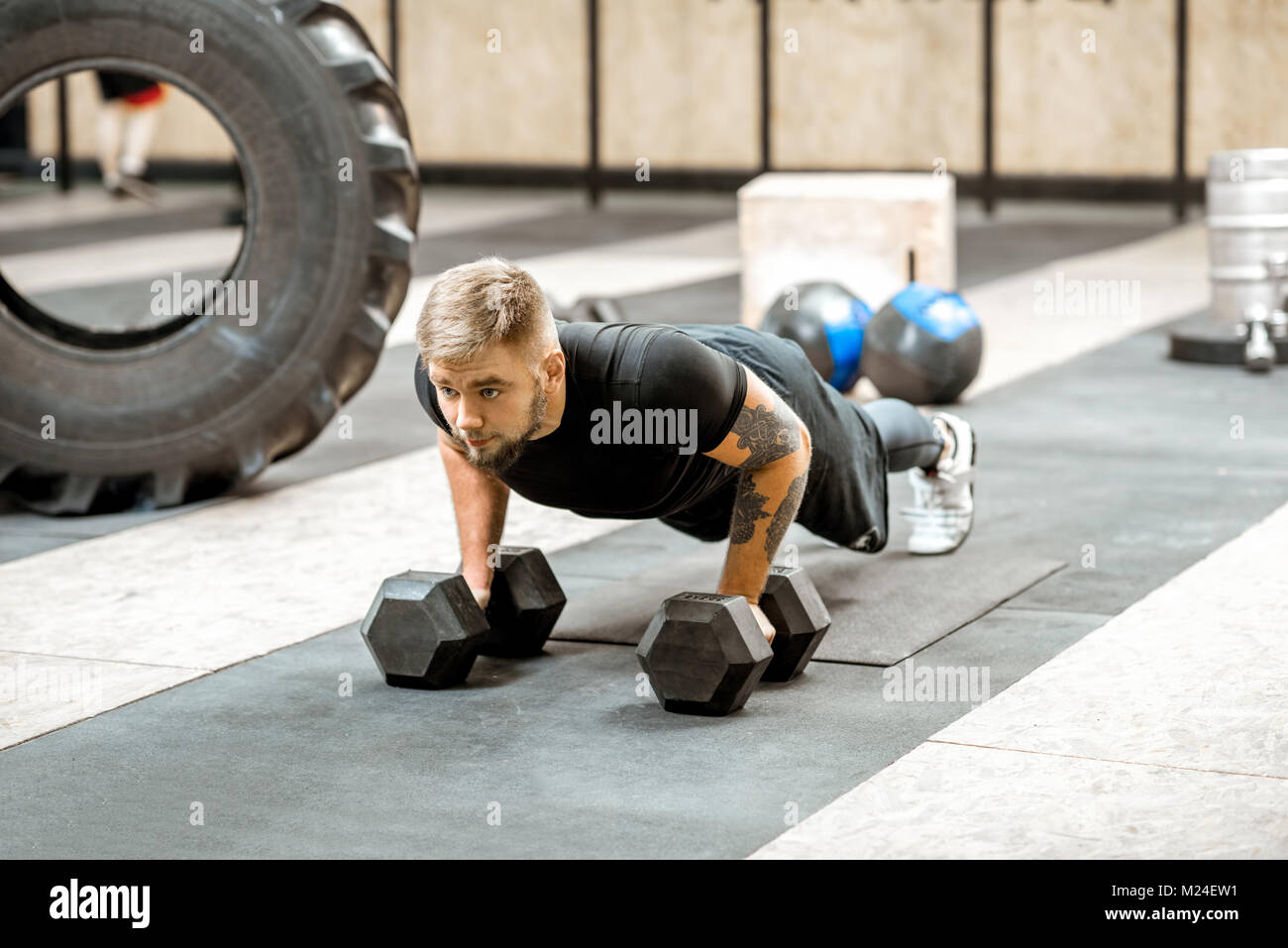 Man pushing ups in the gym Stock Photo - Alamy