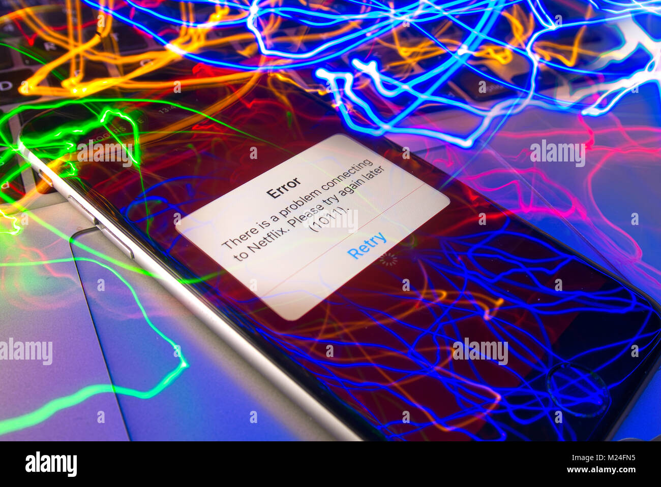 Concept of a bad connection on an iPhone for Netflix.Credit:Mario ...