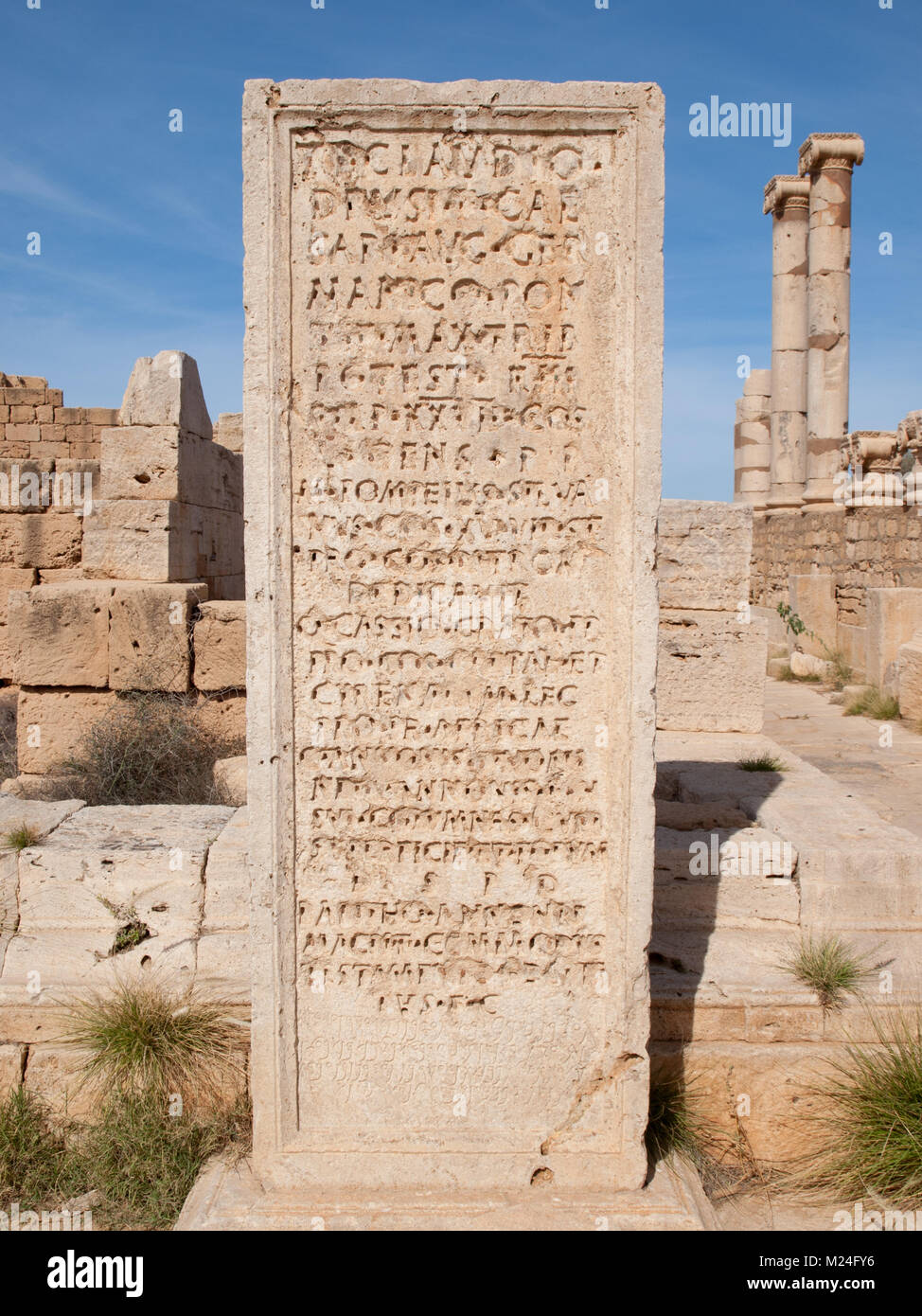 Stone with writing in the Old Forum in Leptis Magna Stock Photo - Alamy