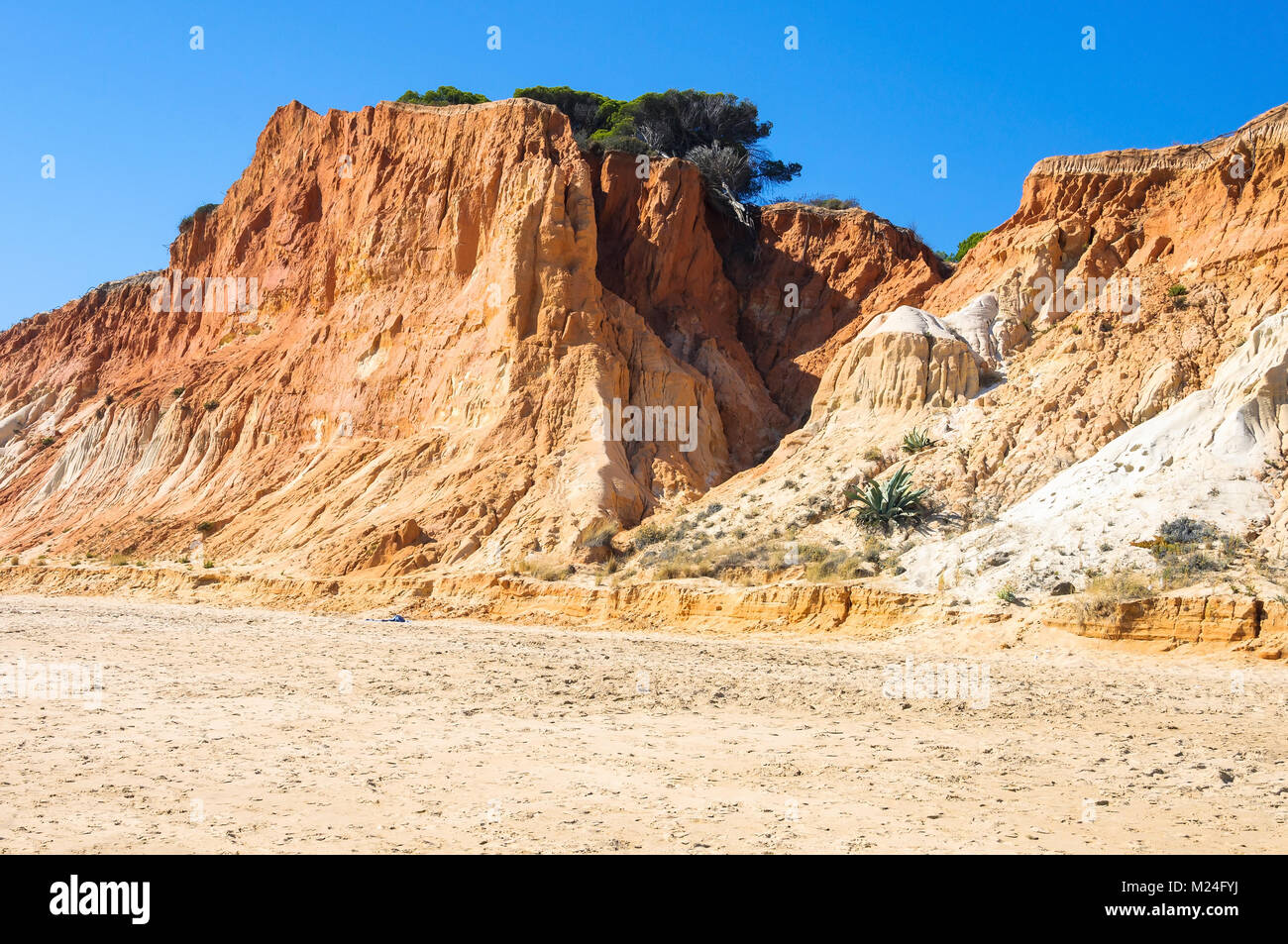 Red cliffs at Falesia Beach in Algarve region, Portugal Stock Photo - Alamy