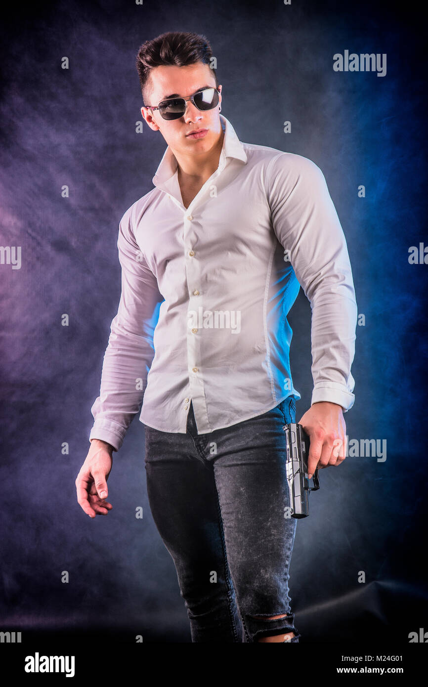 Man pointing gun hi-res stock photography and images - Alamy