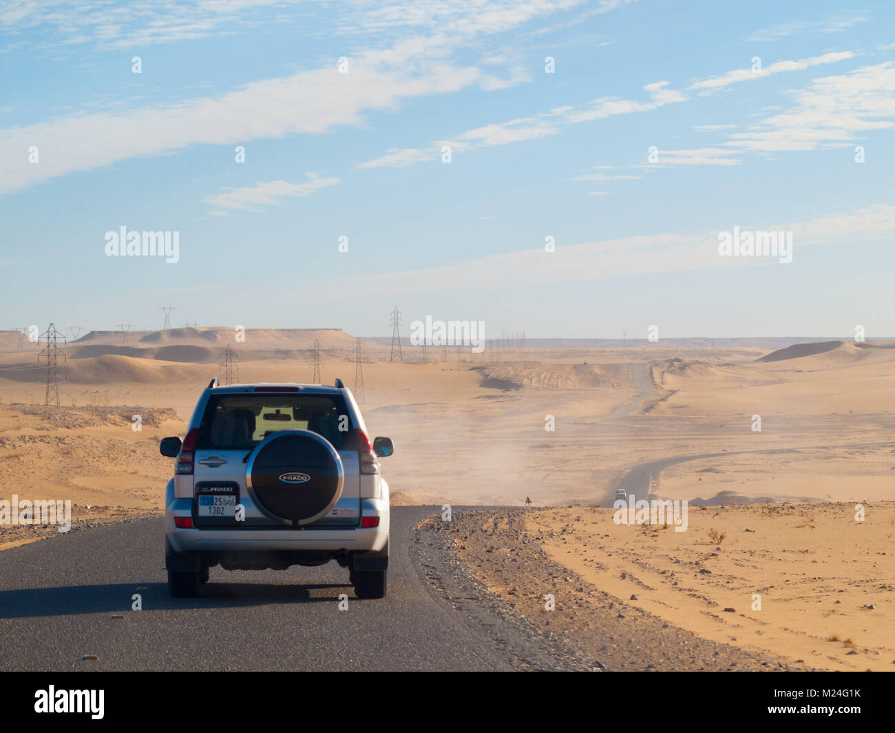 4x4 car in a road in the Libyan desert Stock Photo - Alamy