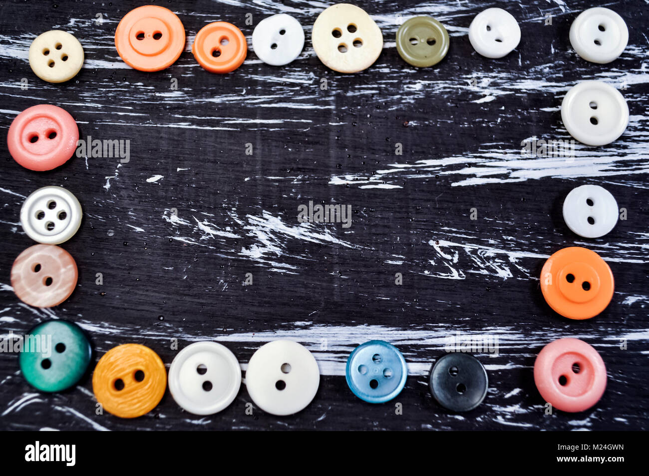 Buttons for clothing and sewing on the table. Decorative items o Stock ...