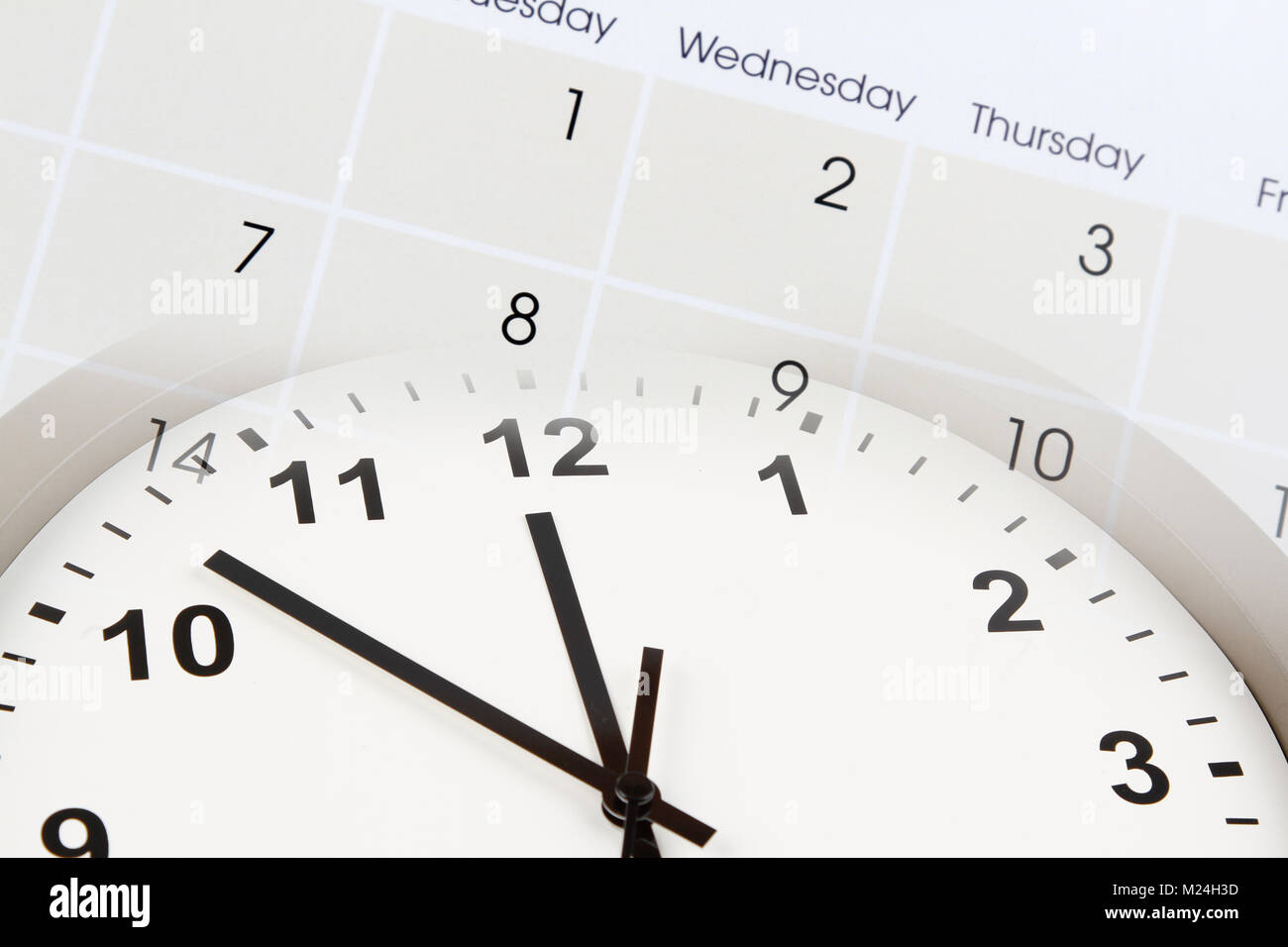 Clock face and calendar composite Stock Photo - Alamy