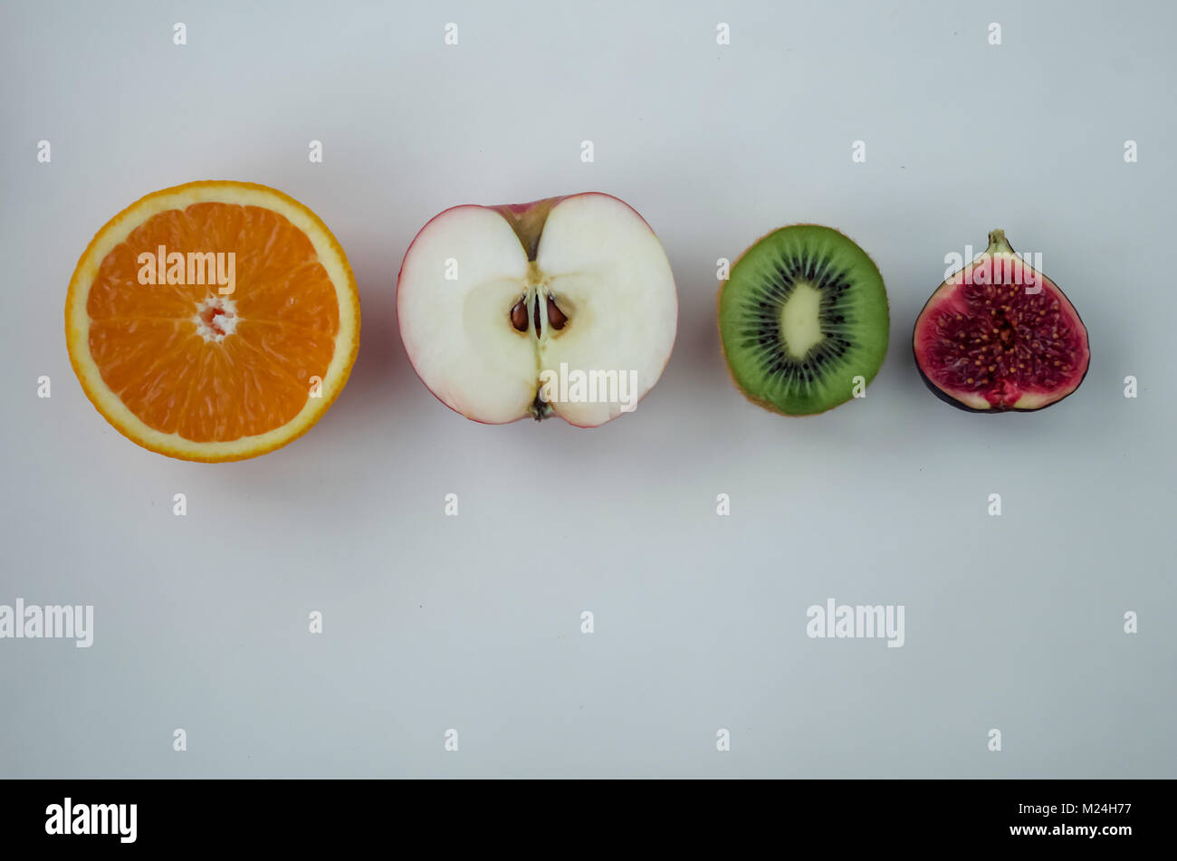 Background of fresh sliced fruit on a table in the afterno Stock Photo ...