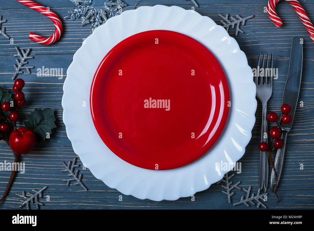 Plates and dishes for the Christmas table. Festive table setting Stock ...