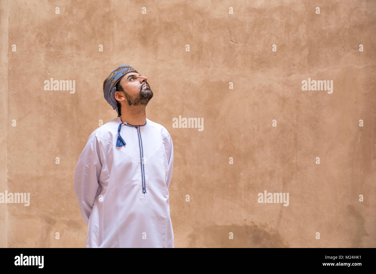 omani man dressed in traditional outfit Stock Photo - Alamy