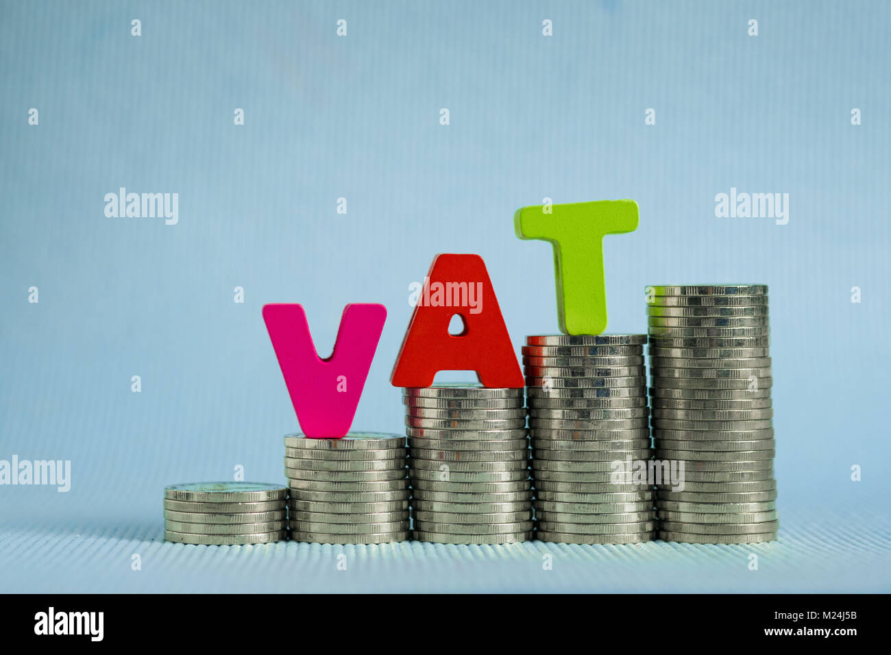 VAT (Value Added Tax) concept. Word VAT alphabet made from wood with ...