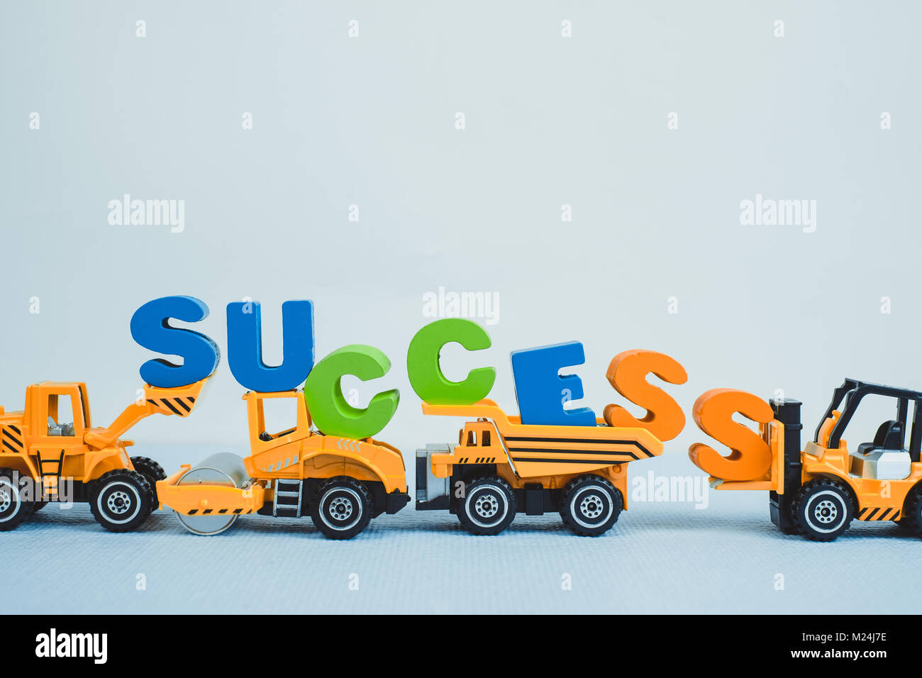 Mini forklift bulldozer truck and road roller machine with text SUCCESS ...