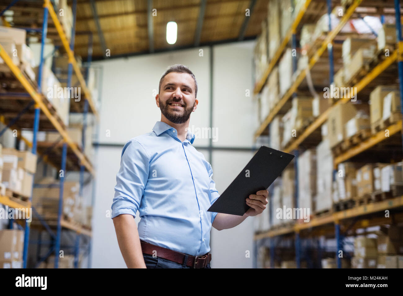 Portrait of a male warehouse worker or supervisor Stock Photo - Alamy