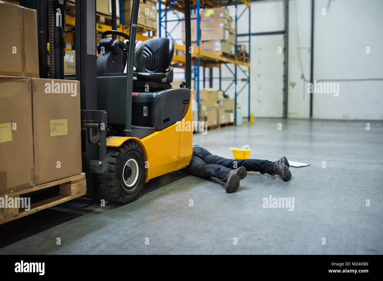 Warehouse worker after an accident in a warehouse Stock Photo ...
