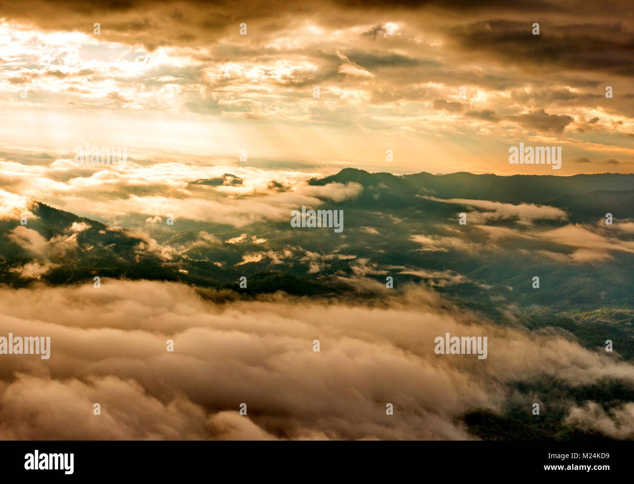 Dramatic sunset sky with evening sky clouds lit by bright sunlight ...