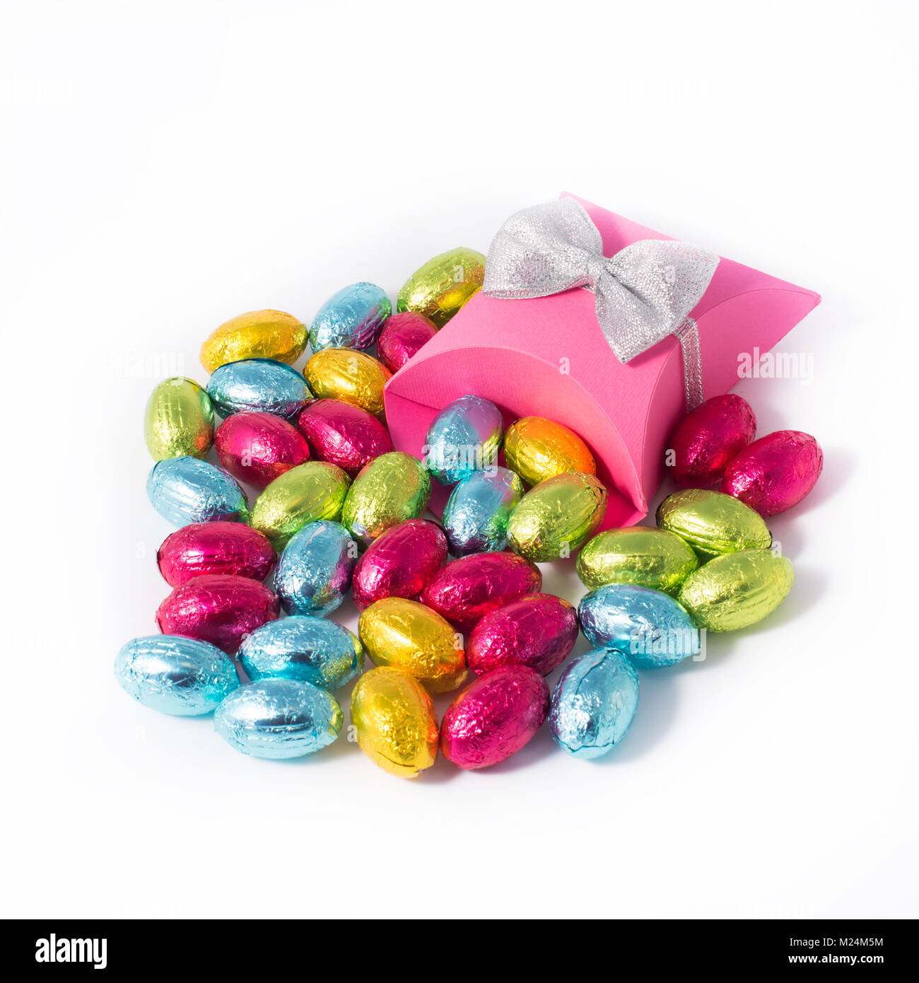 Pink box with chocolate easter eggs Stock Photo - Alamy