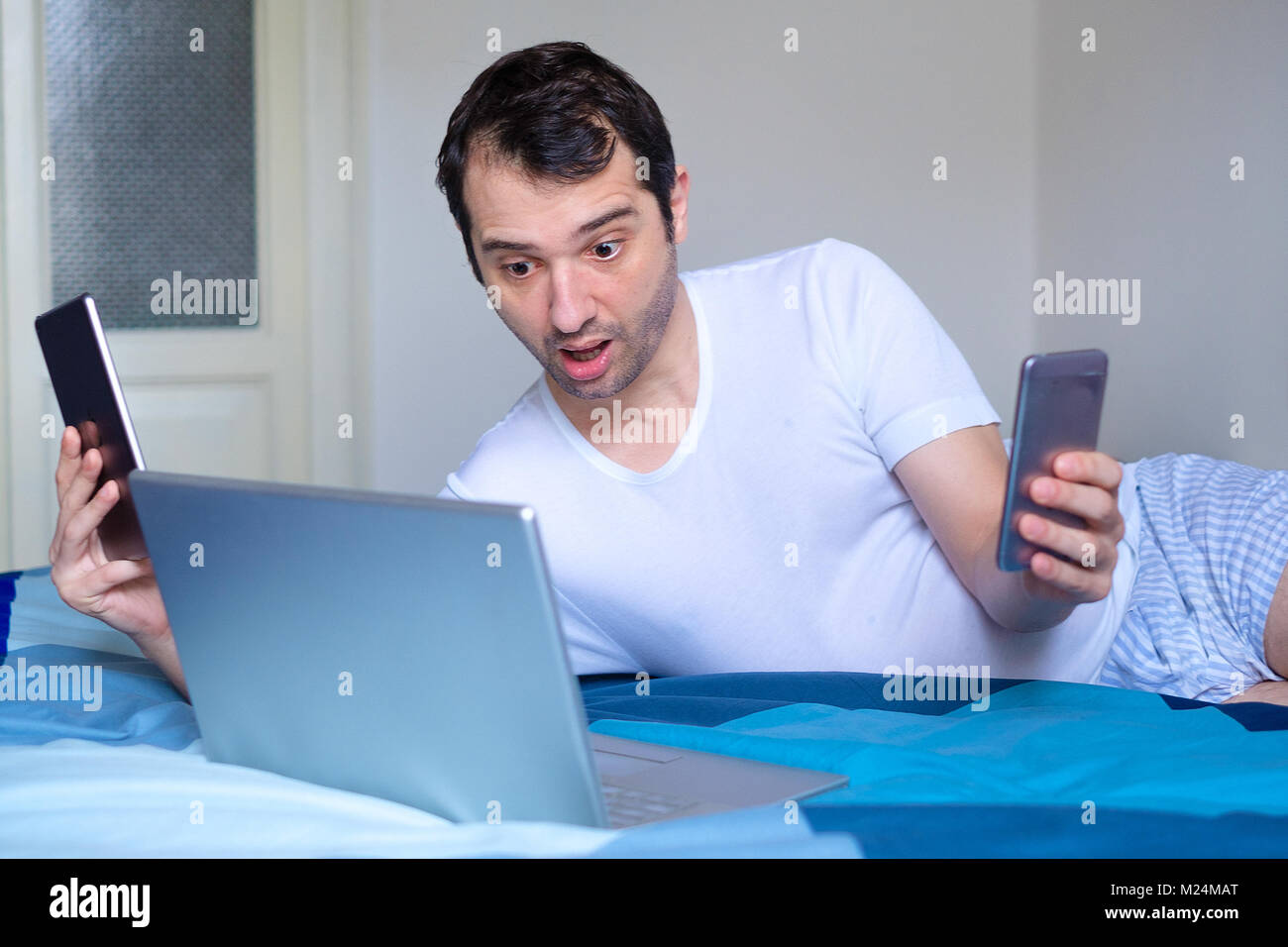 Man watching from bed hi-res stock photography and images - Alamy
