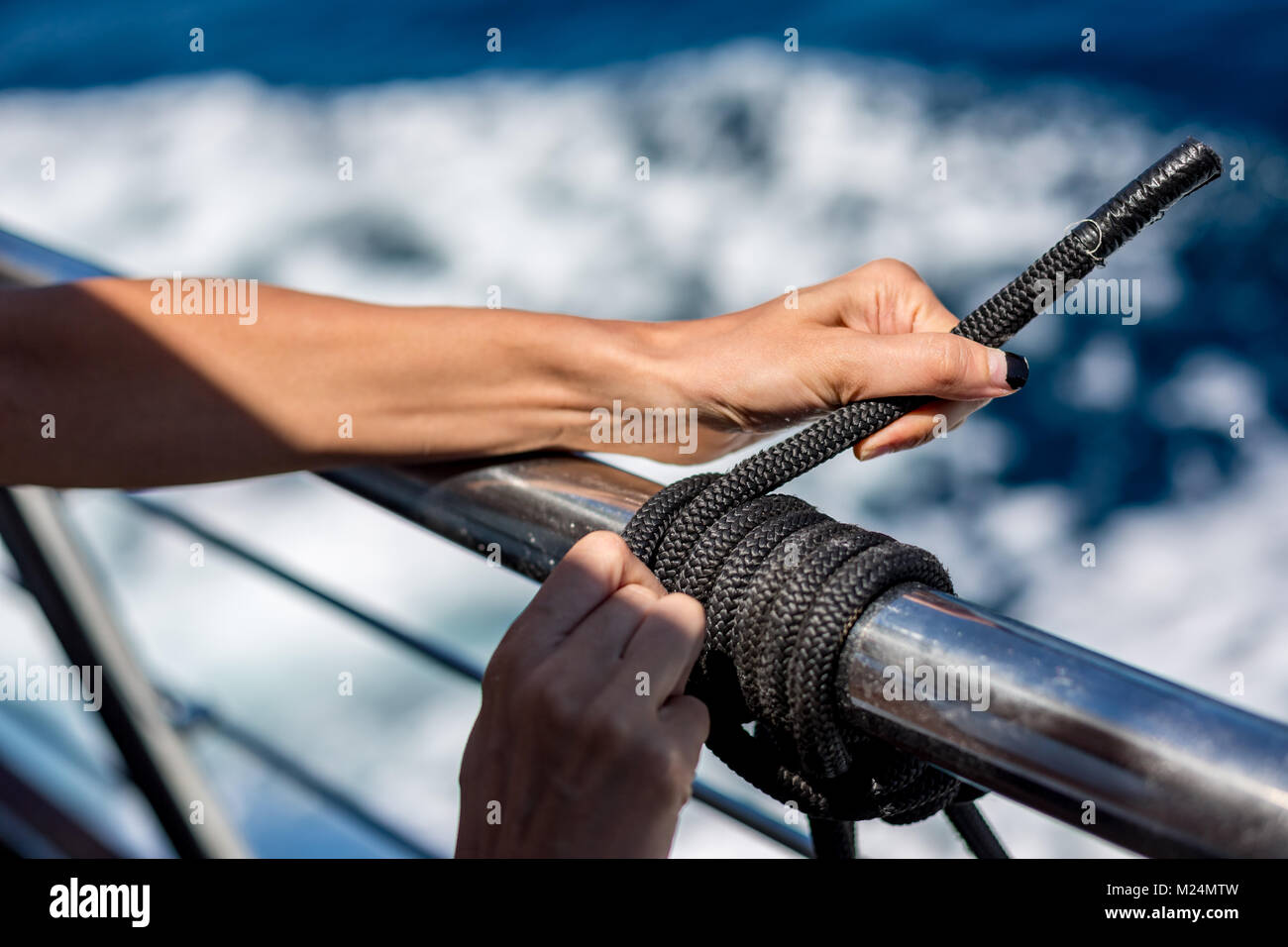 Woman tight rope hi-res stock photography and images - Alamy
