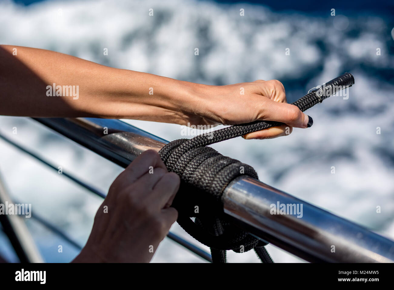 Woman tying tie female hi-res stock photography and images - Alamy