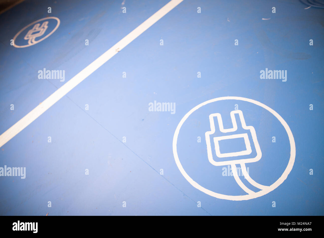 Electric charging point and parking space with painted charging hi-res ...