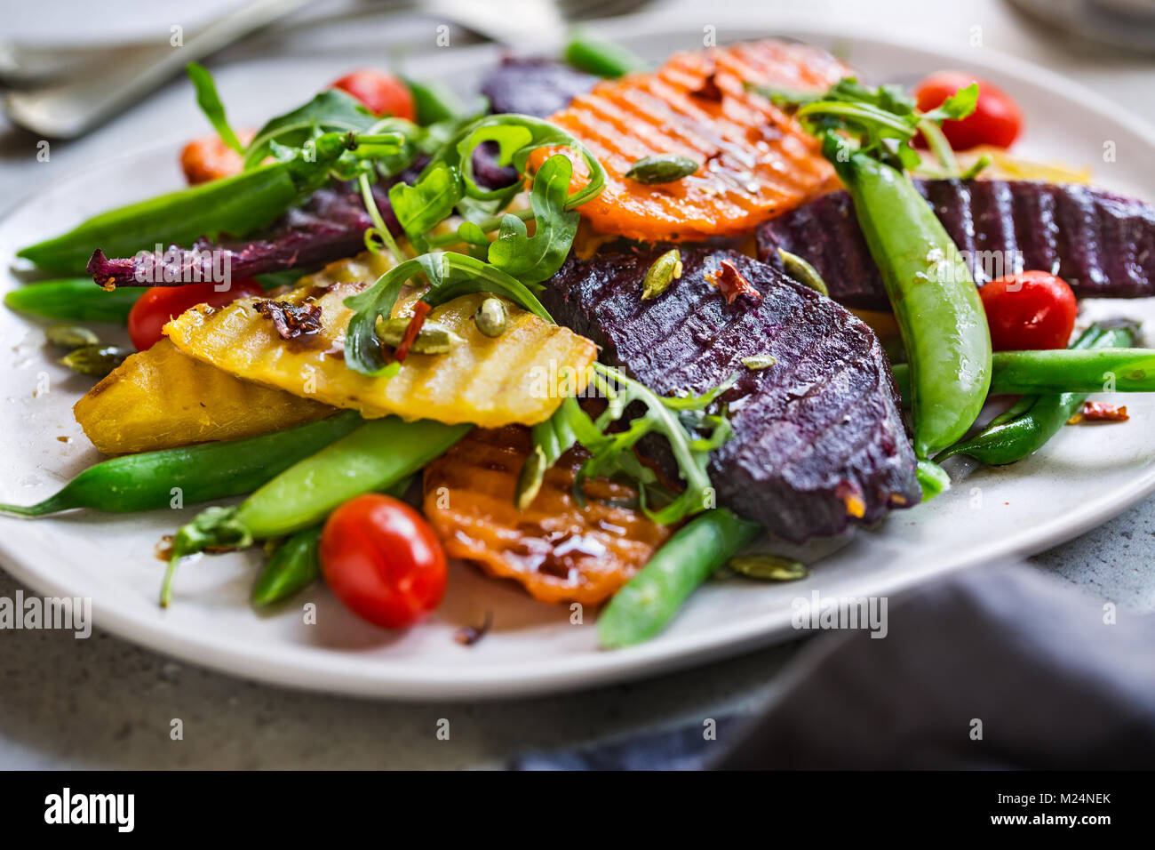 Grilled Sweet Potatoes with Snap pea,Cherry tomatoes and Rocket Stock ...