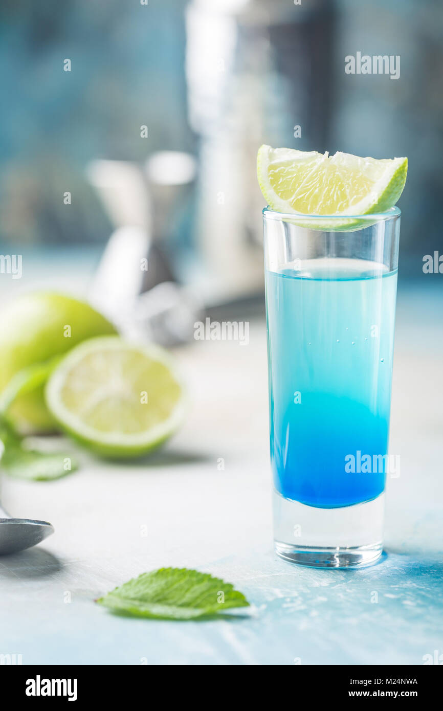 A blue layer alcoholic cocktail Stock Photo - Alamy