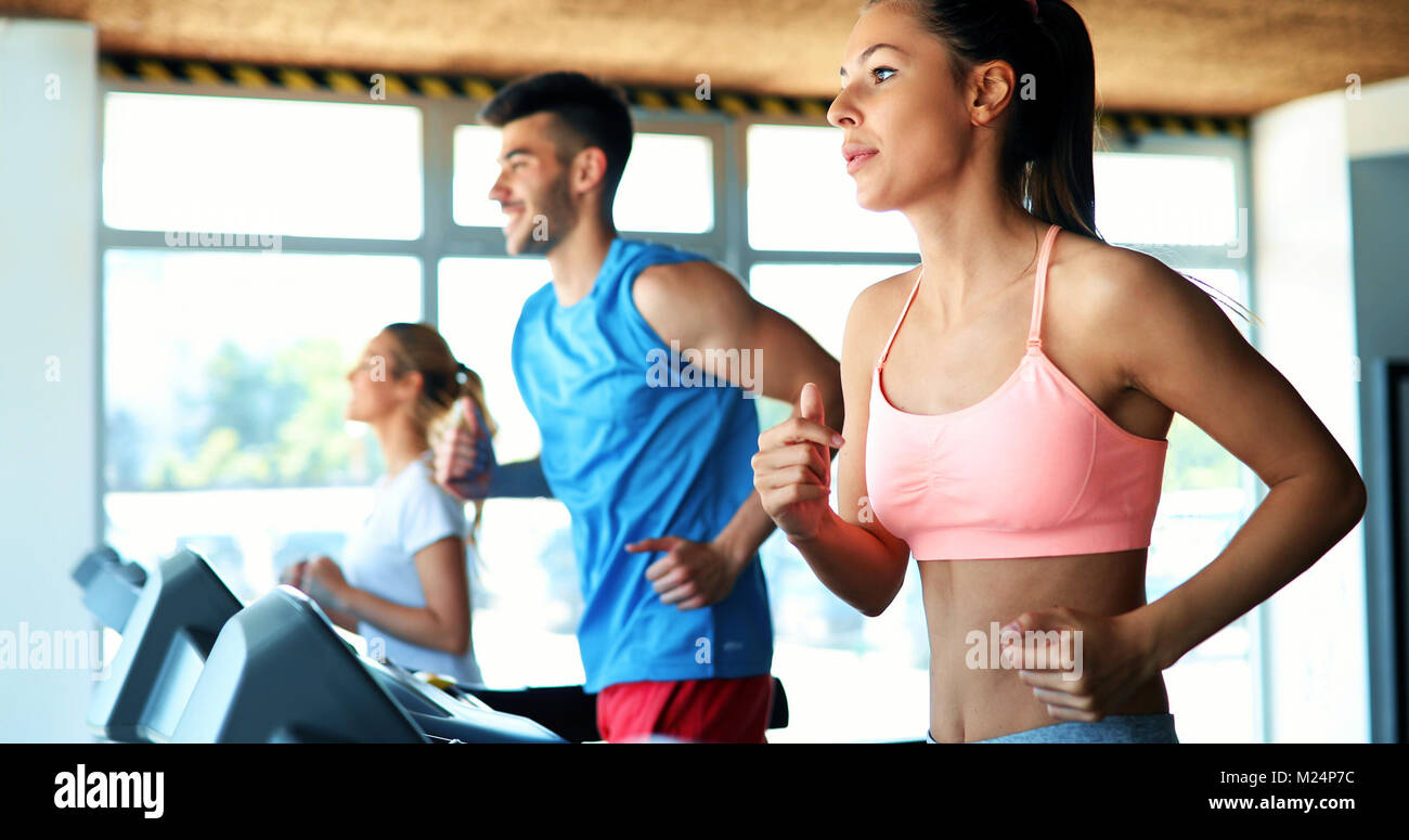 Young attractive woman doing cardio training in gym Stock Photo - Alamy