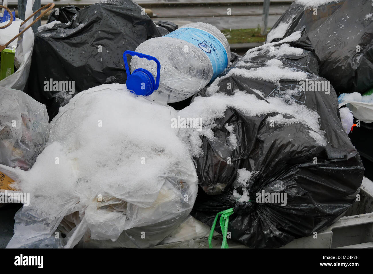 Waste bins overflowing with garbage, Lyon, France Stock Photo - Alamy