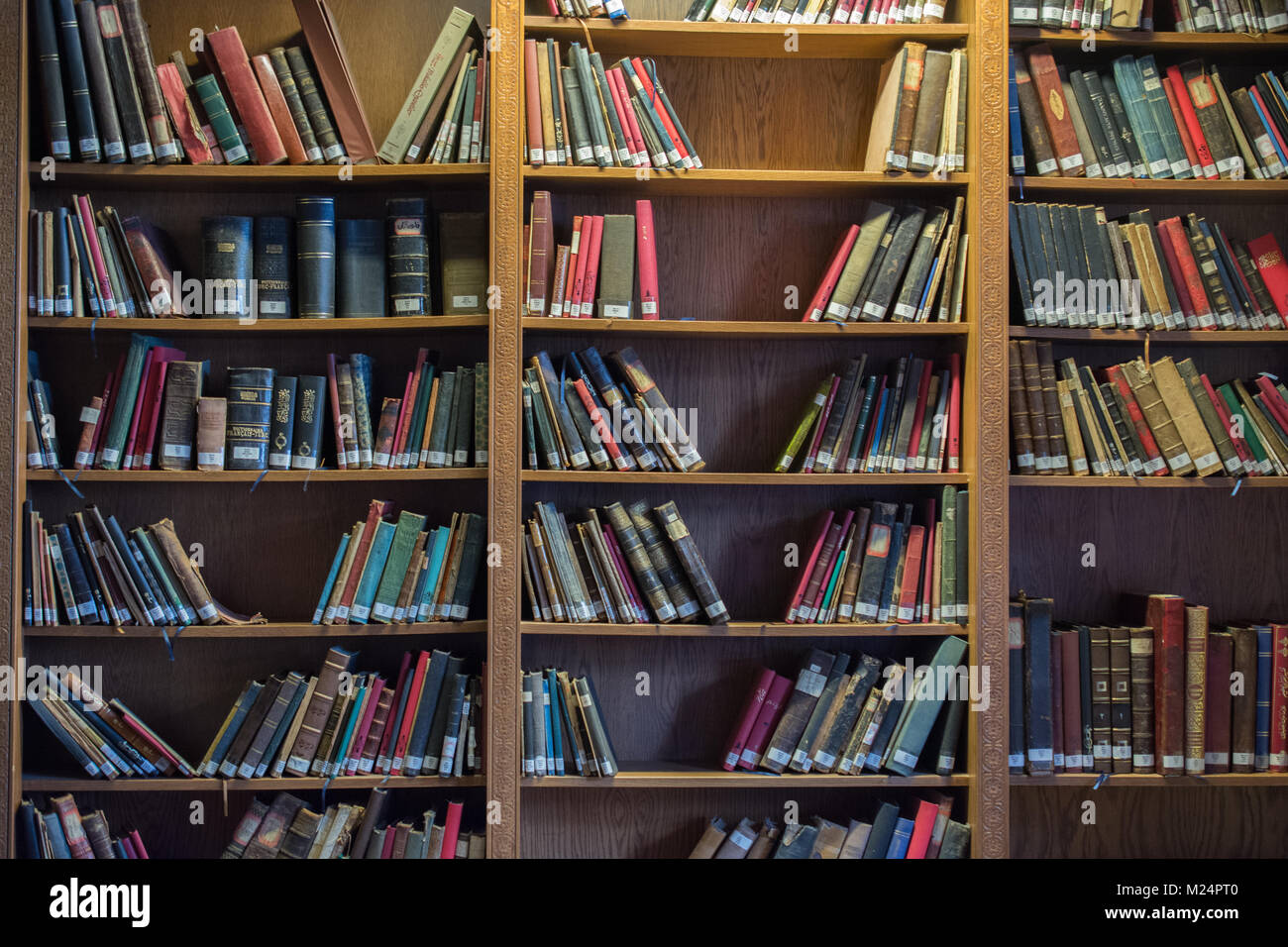 Bookshelf with old Turkish Ottoman handwriting books Stock Photo - Alamy