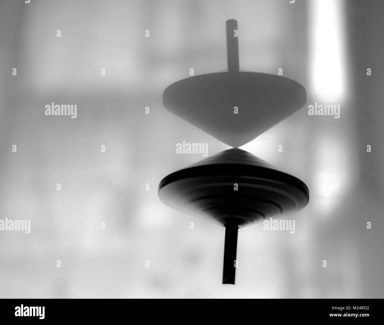 Wooden spinning top Black and White Stock Photos & Images - Alamy