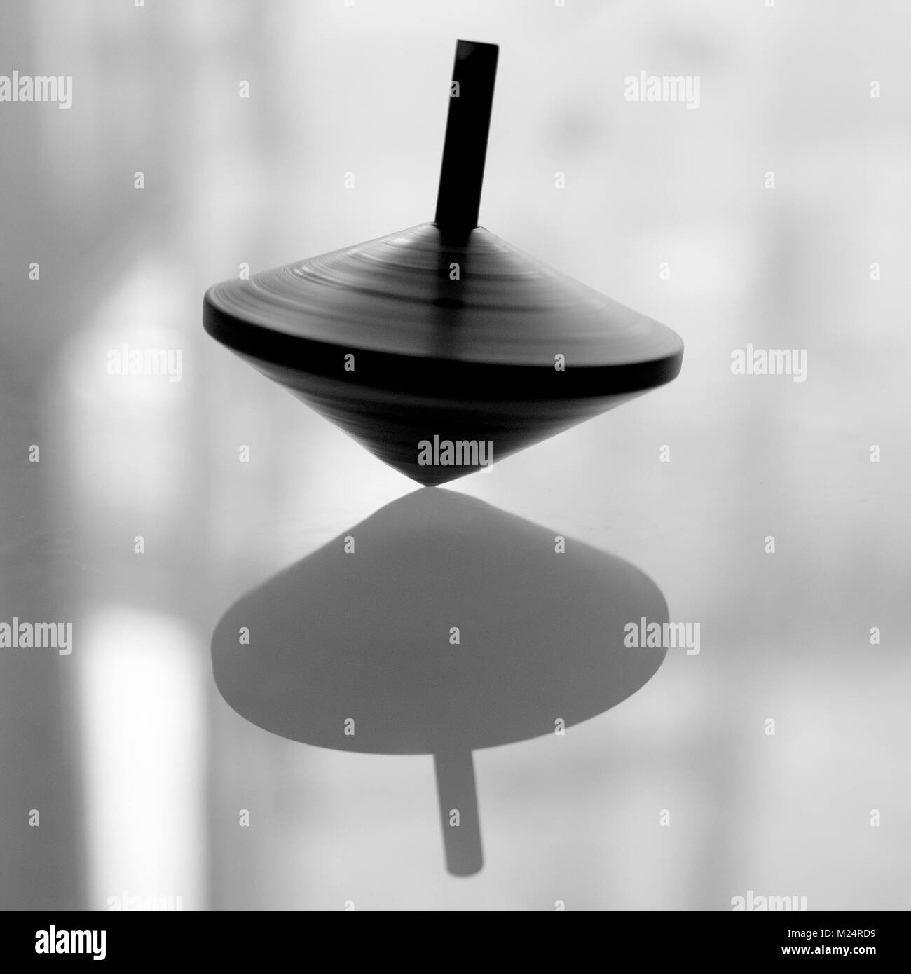 Spinning top toy Black and White Stock Photos & Images - Alamy