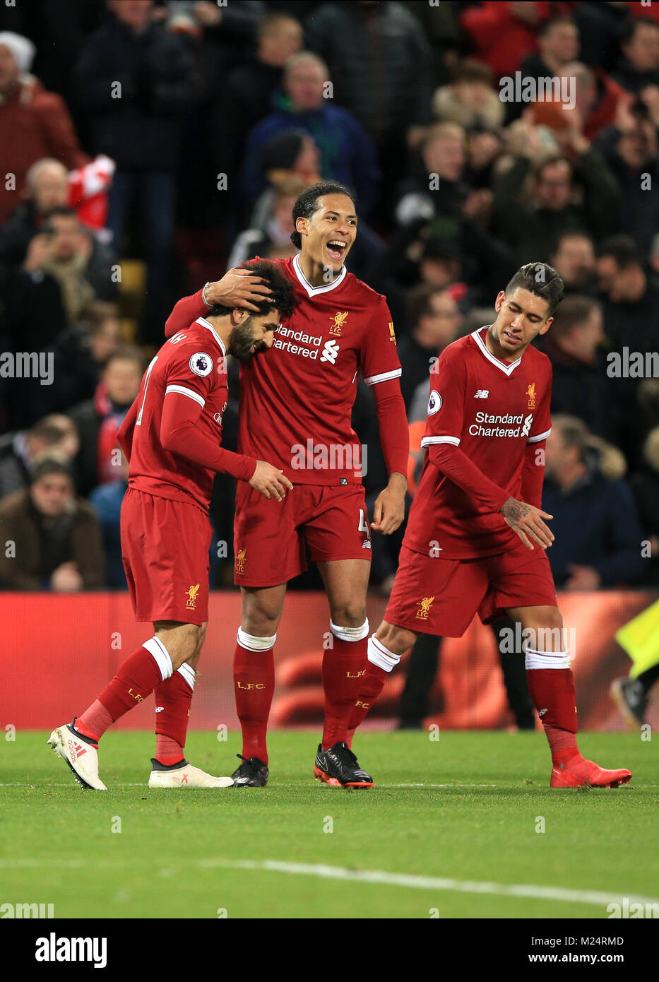 Liverpool's Mohamed Salah celebrates scoring his side's second goal of ...