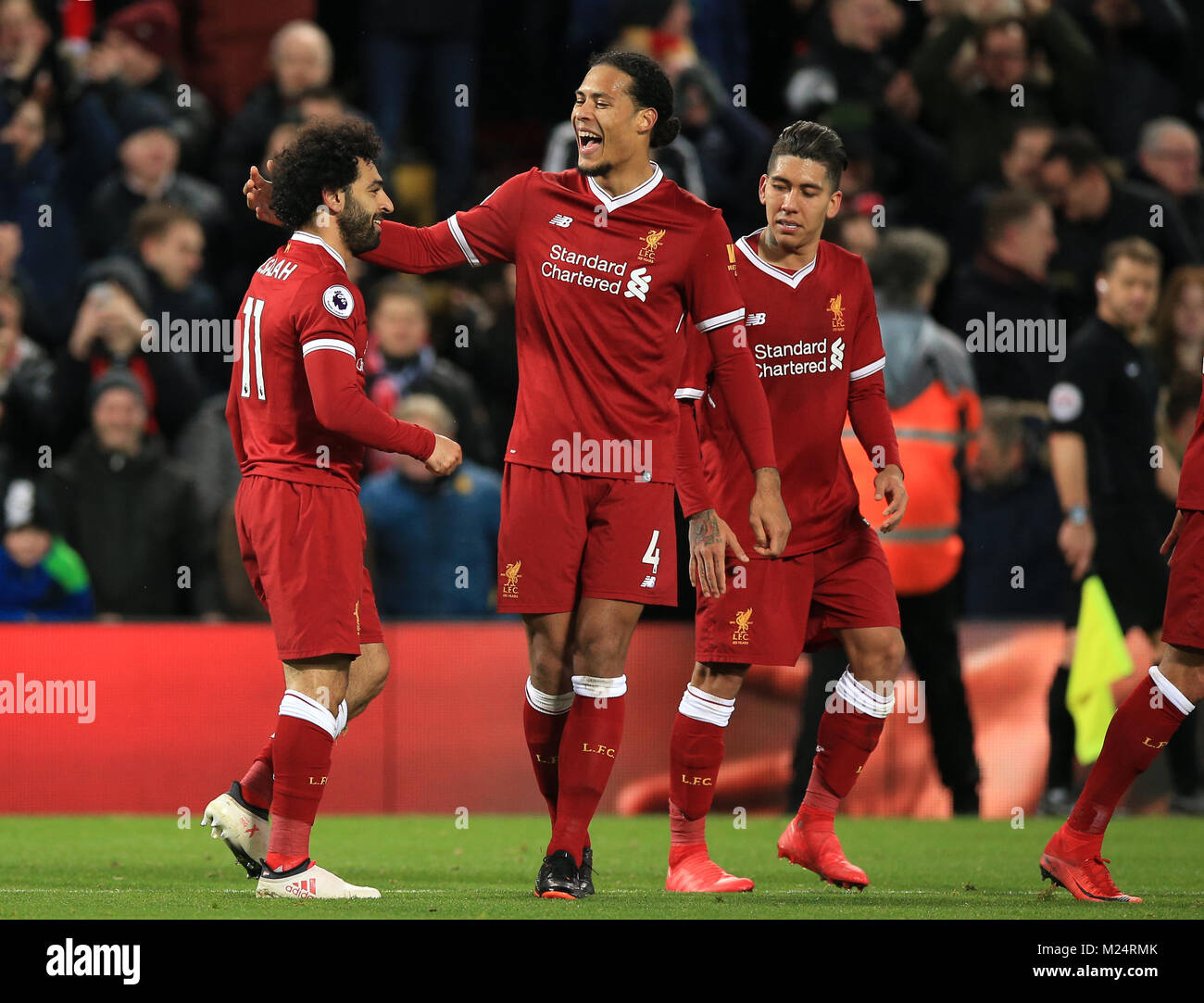 Liverpool's Mohamed Salah celebrates scoring his side's second goal of ...