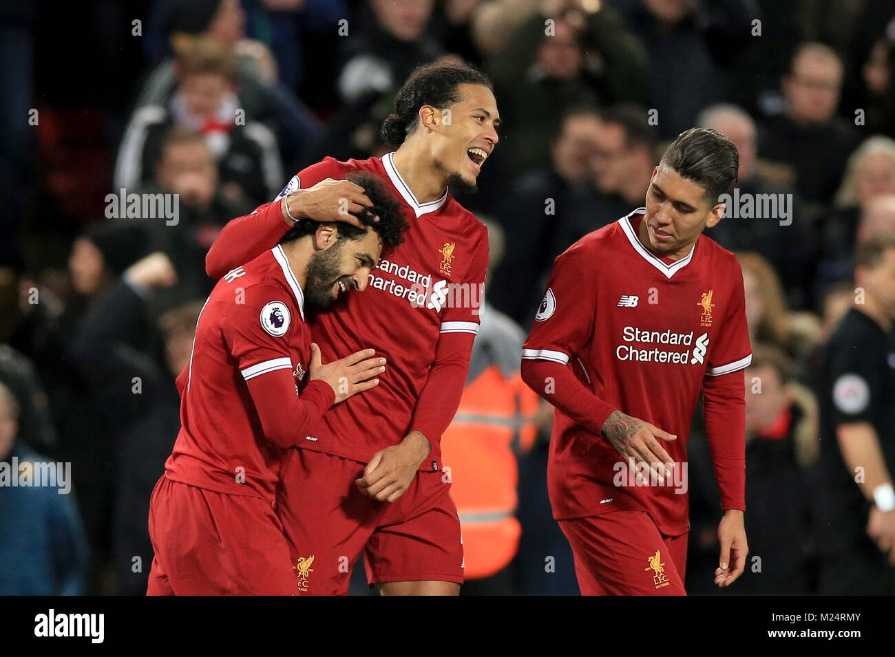 Liverpool's Mohamed Salah celebrates scoring his side's second goal of ...