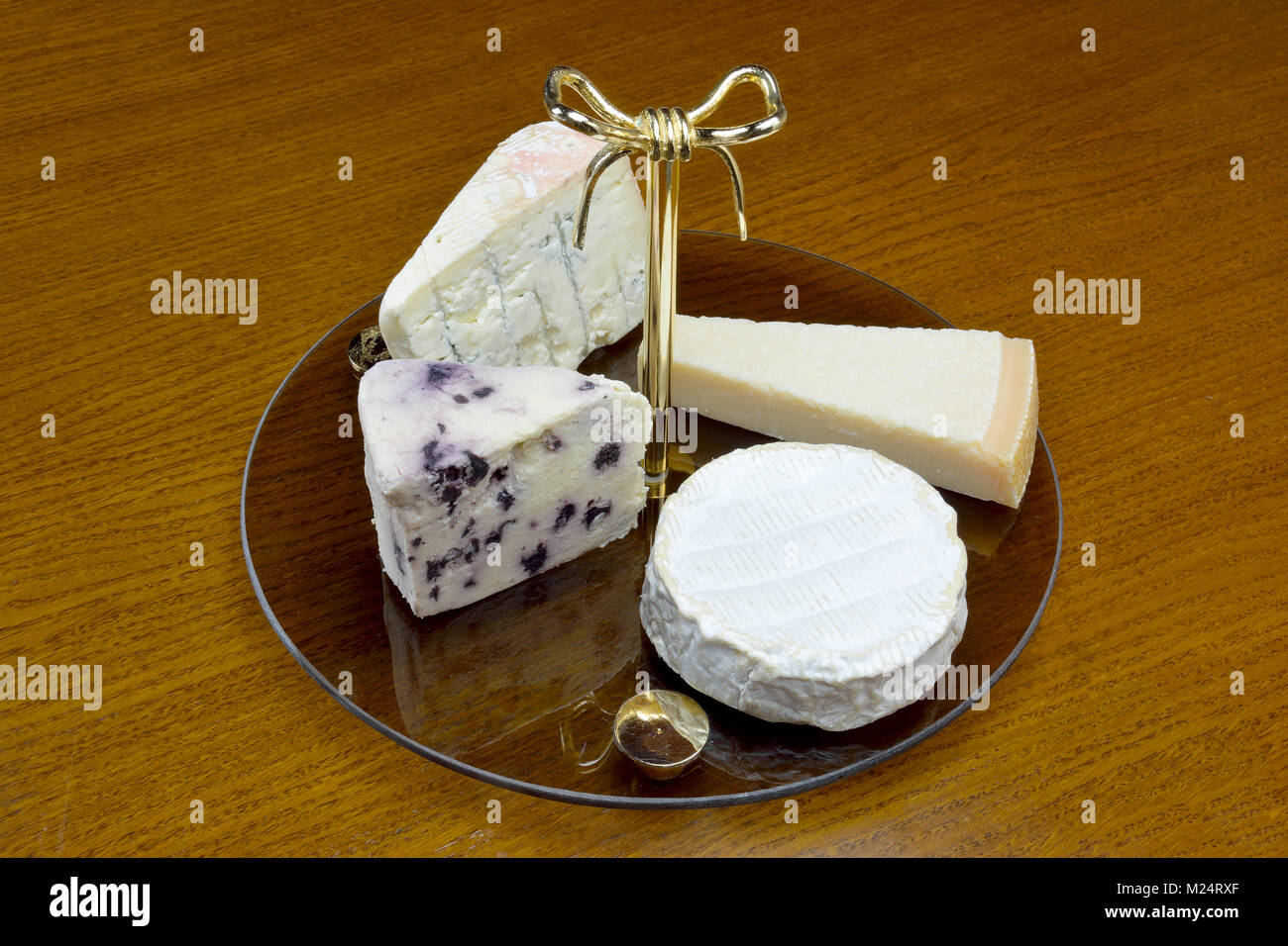 Platter with camembert, parmigiano, gorgonzola and white stilton with ...
