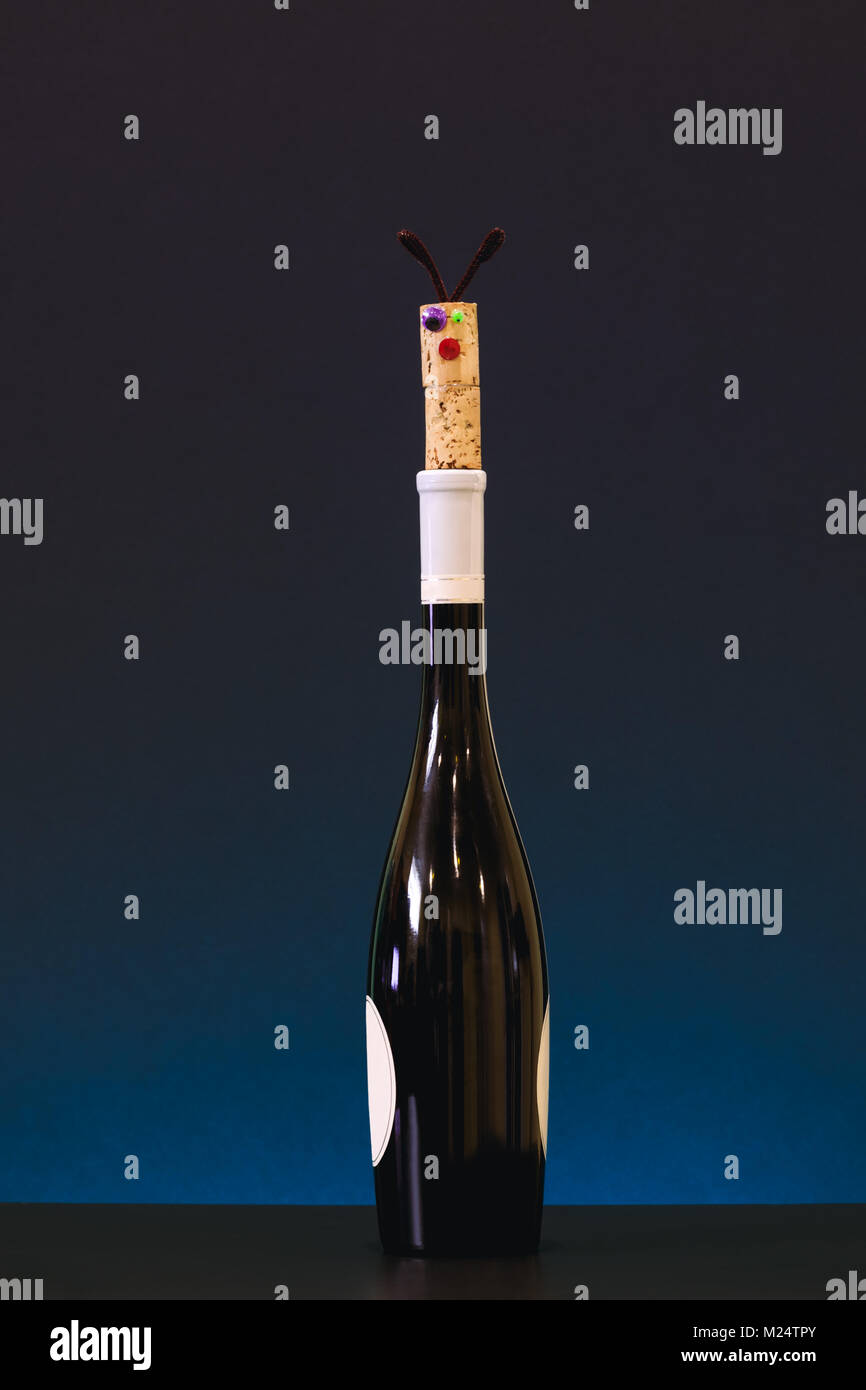 Funny cork stopper on top of wine bottle. Picture of cork stopper and ...