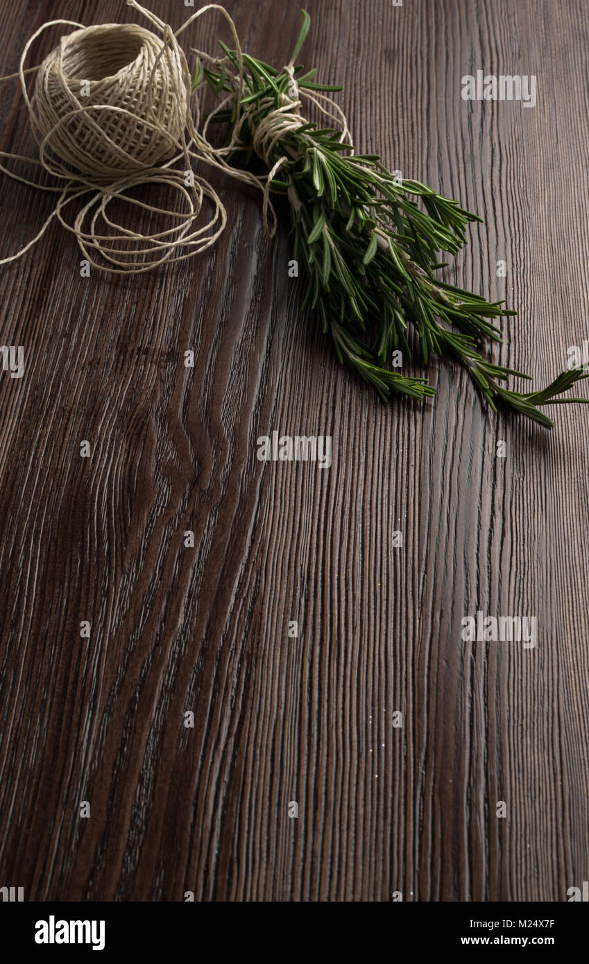 organic green rosemary branch on the table Stock Photo - Alamy