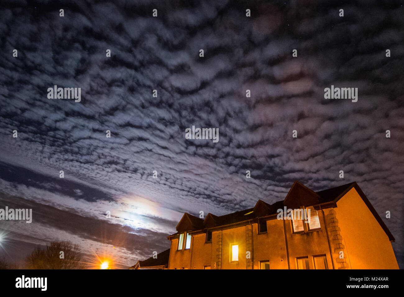 Moon lit clouds Stock Photo - Alamy