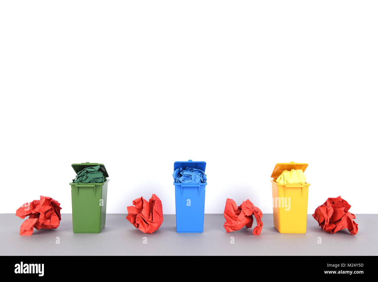 Colorful recycle bins on white and gray background. Recycling concept ...