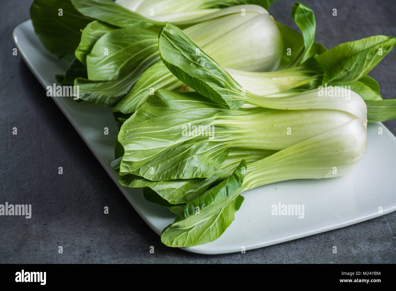 Fresh raw green baby Bok choy or pak choi Chinese cabbage Stock Photo ...
