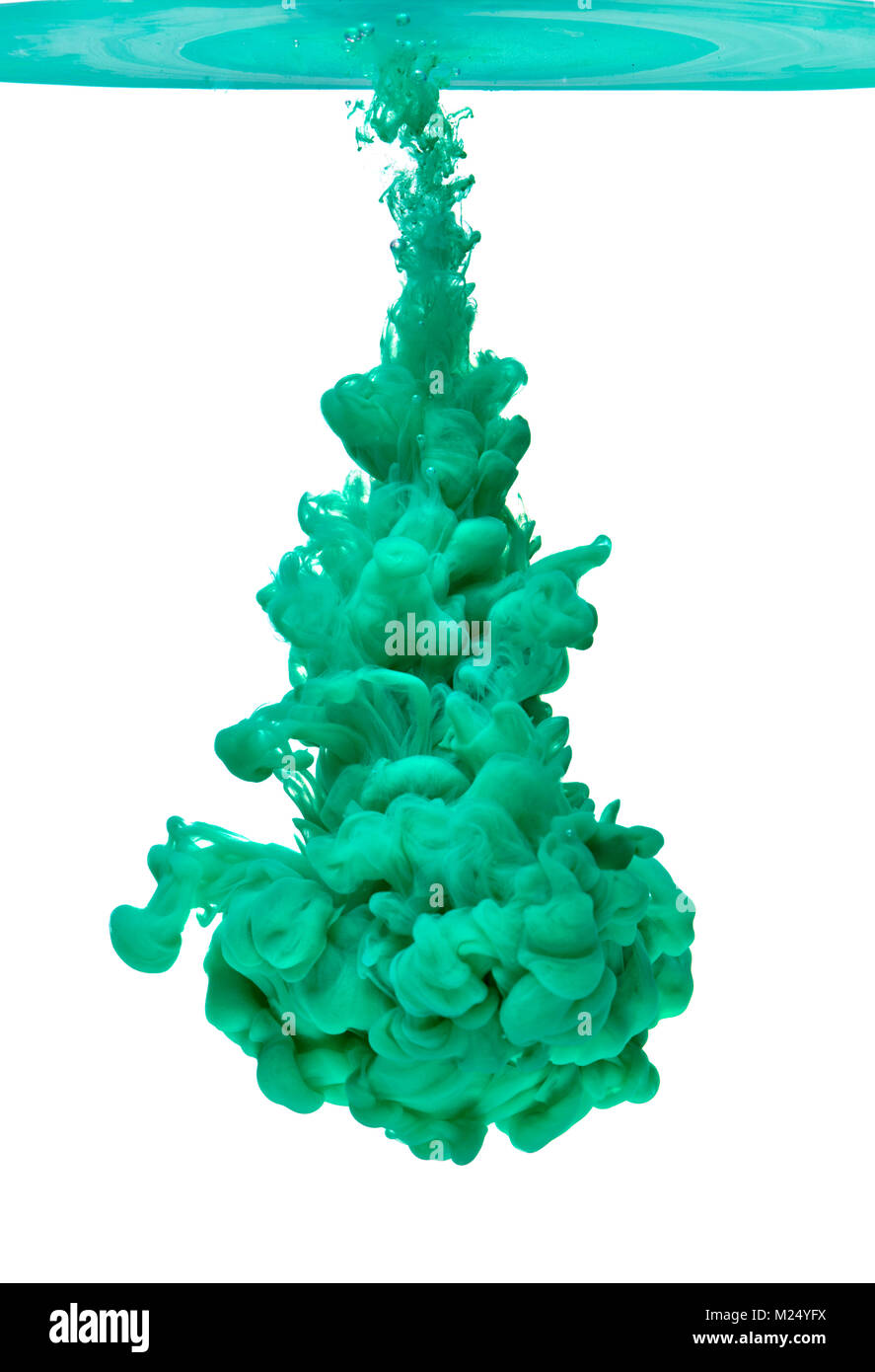 green color paint pouring in water Stock Photo - Alamy