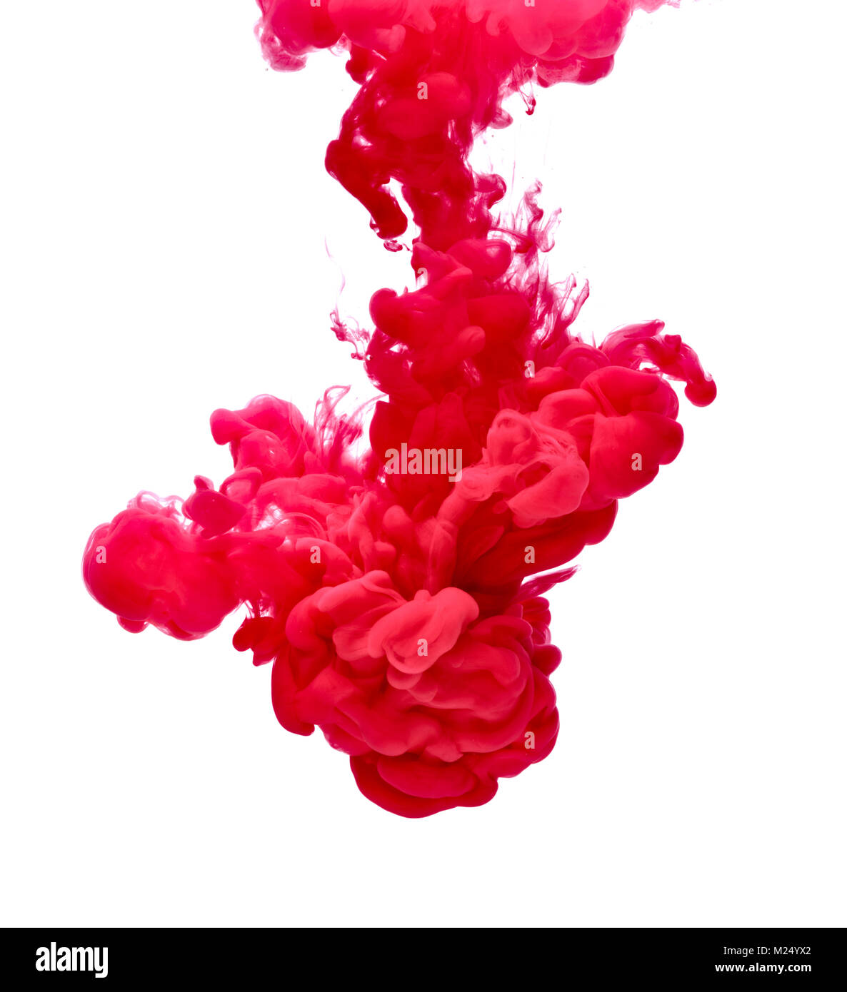 red color paint pouring in water Stock Photo - Alamy