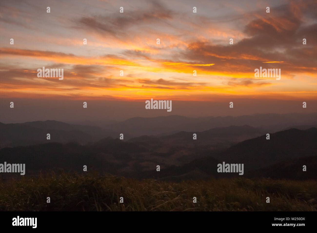 Sunset sky background. Dramatic sunset sky with evening sky clouds lit ...