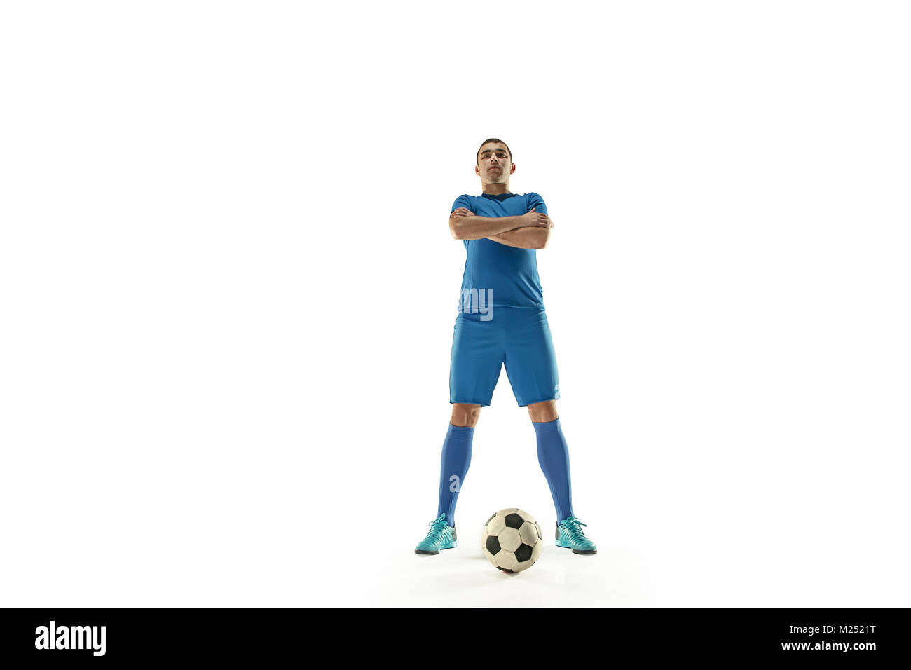 Professional football soccer player with ball isolated white background ...