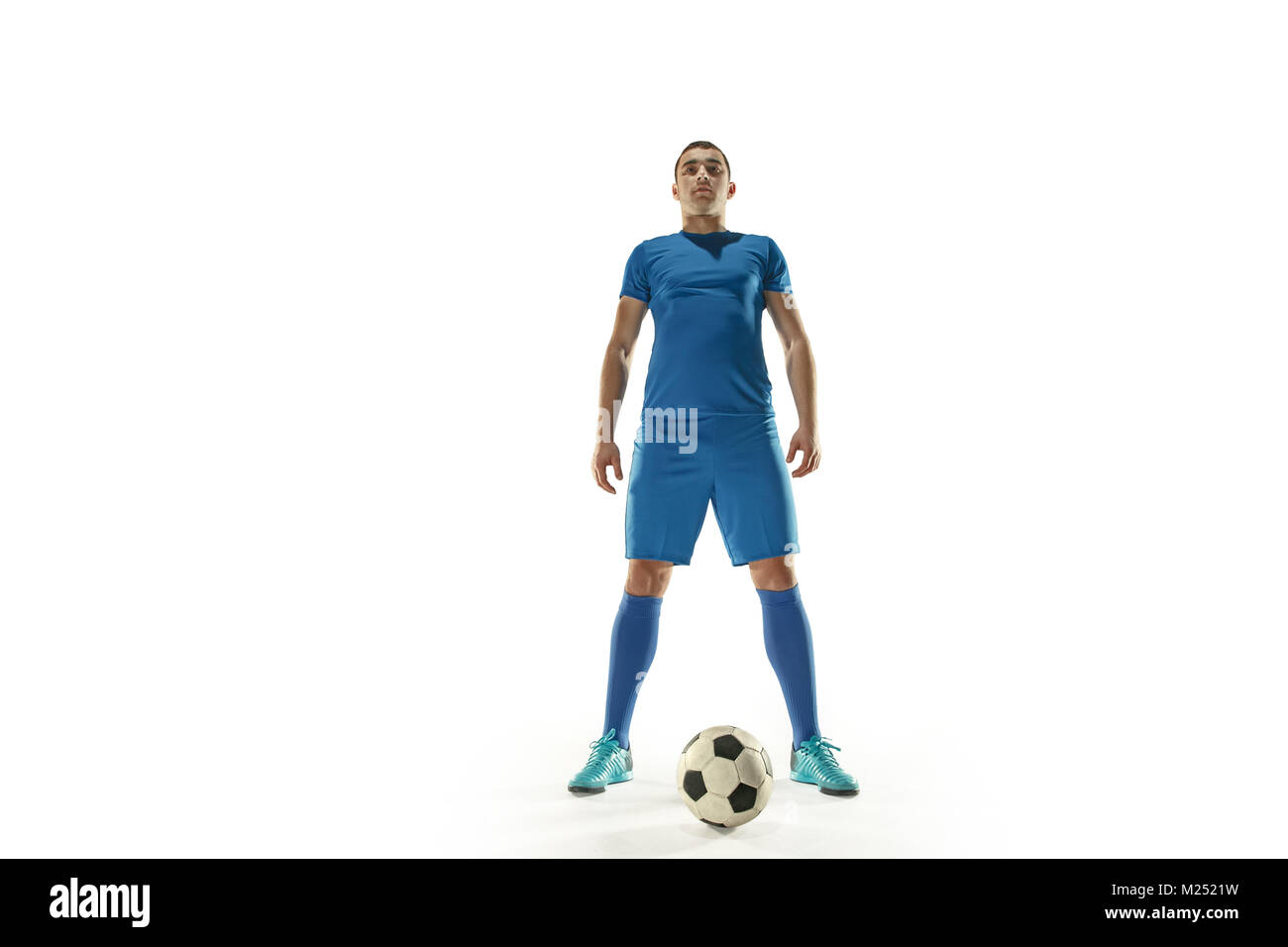 Professional football soccer player with ball isolated white background ...
