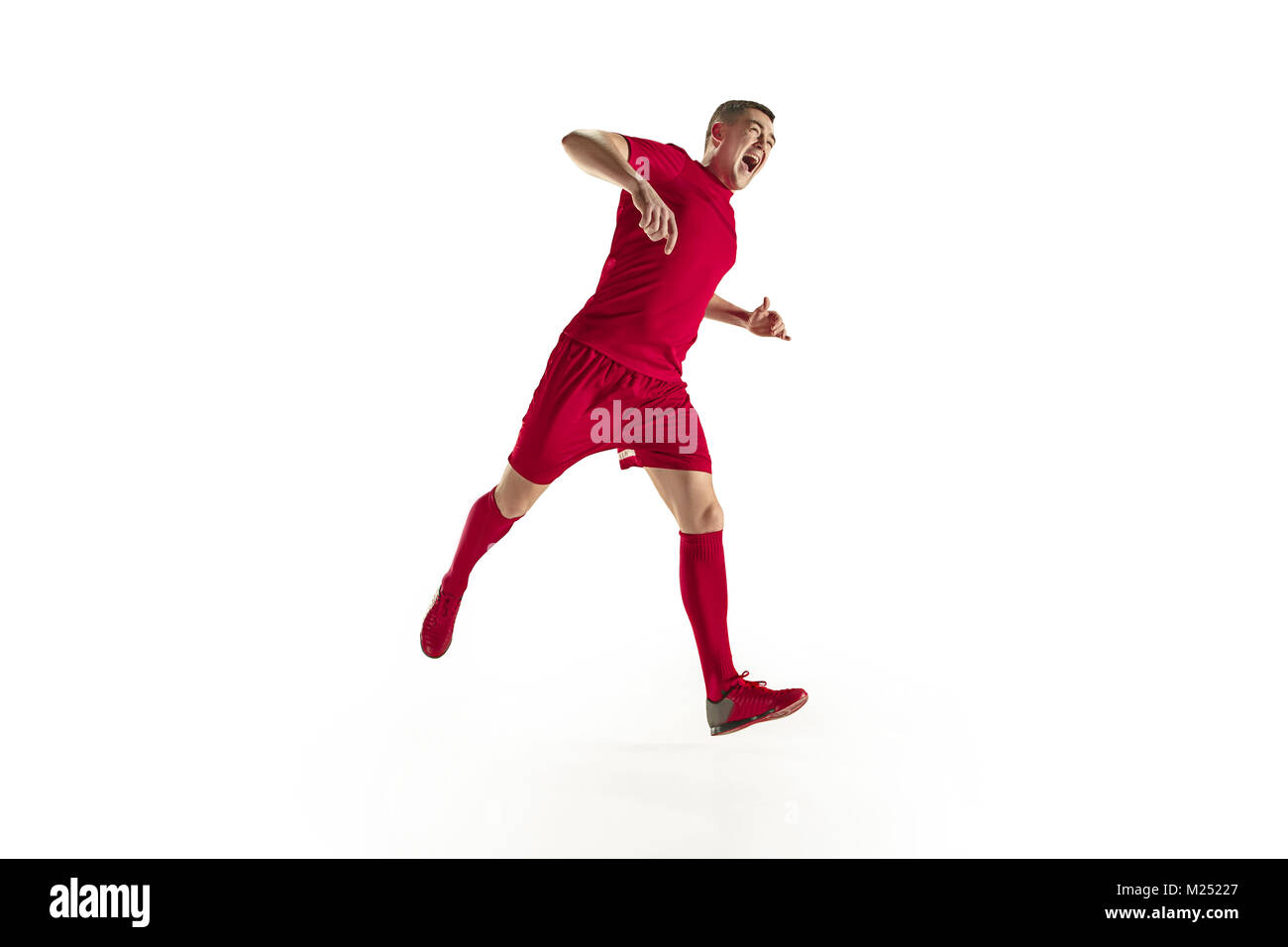 Professional football soccer player isolated on white background Stock ...