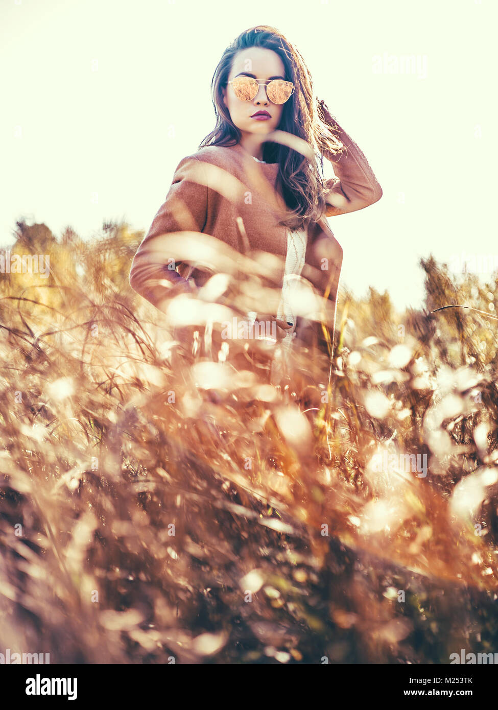 Outdoor fashion photo of young beautiful lady in autumn landscape Stock ...