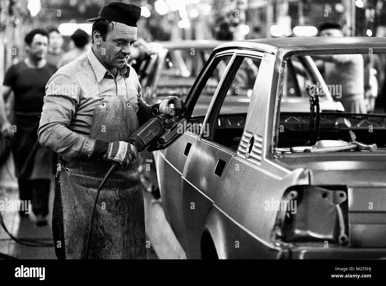 assembly lines in the car factory Alfa Romeo in Arese (Milan, Mars 1978 ...