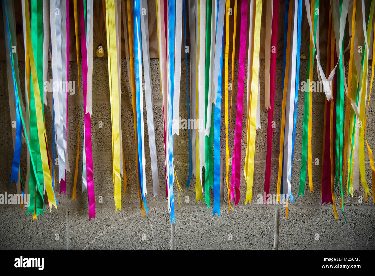 Row of multicoloured silk ribbons Stock Photo - Alamy