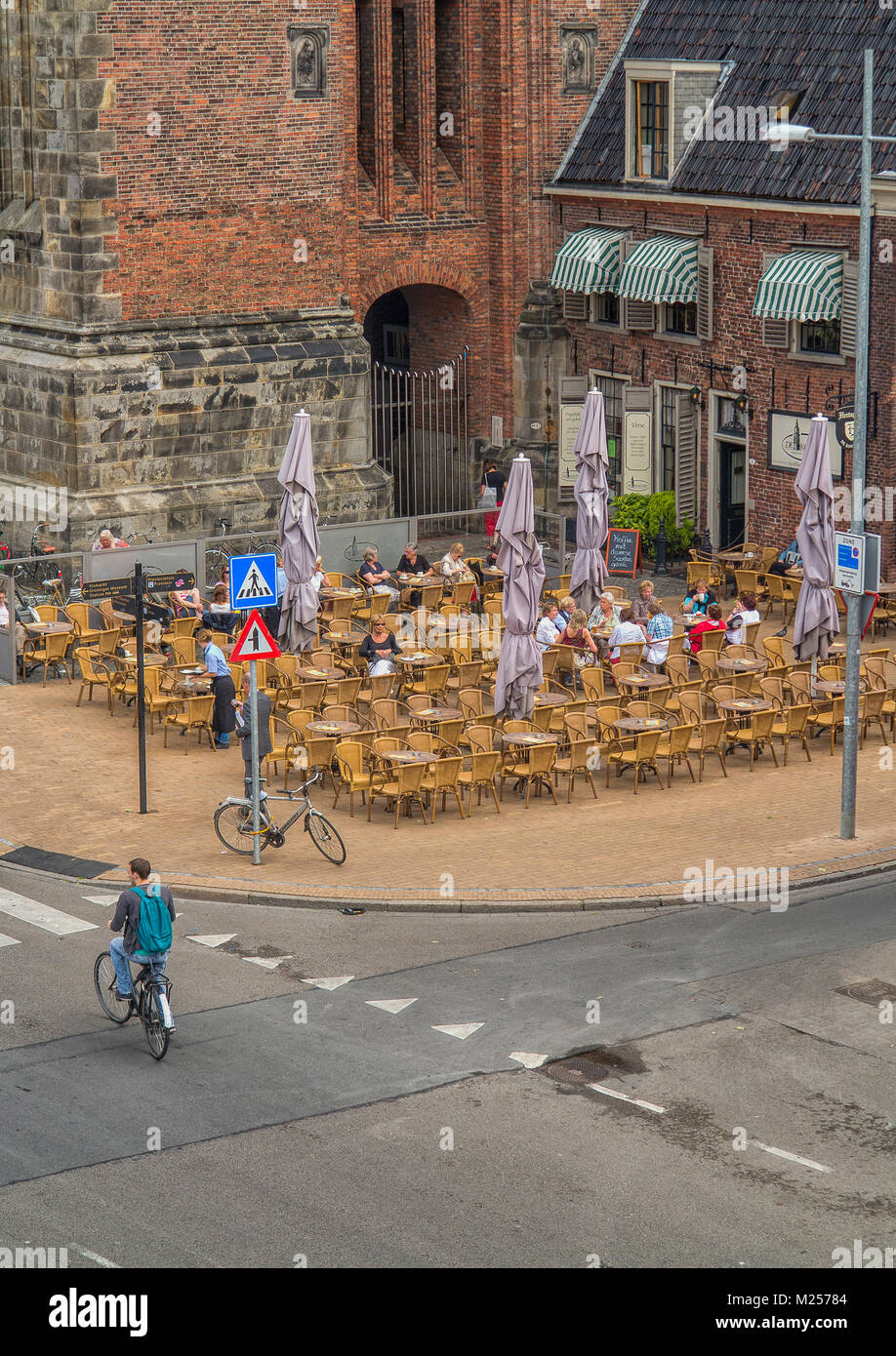 People enjoying a sunny day on an outdoor terrace in Groningen Stock ...