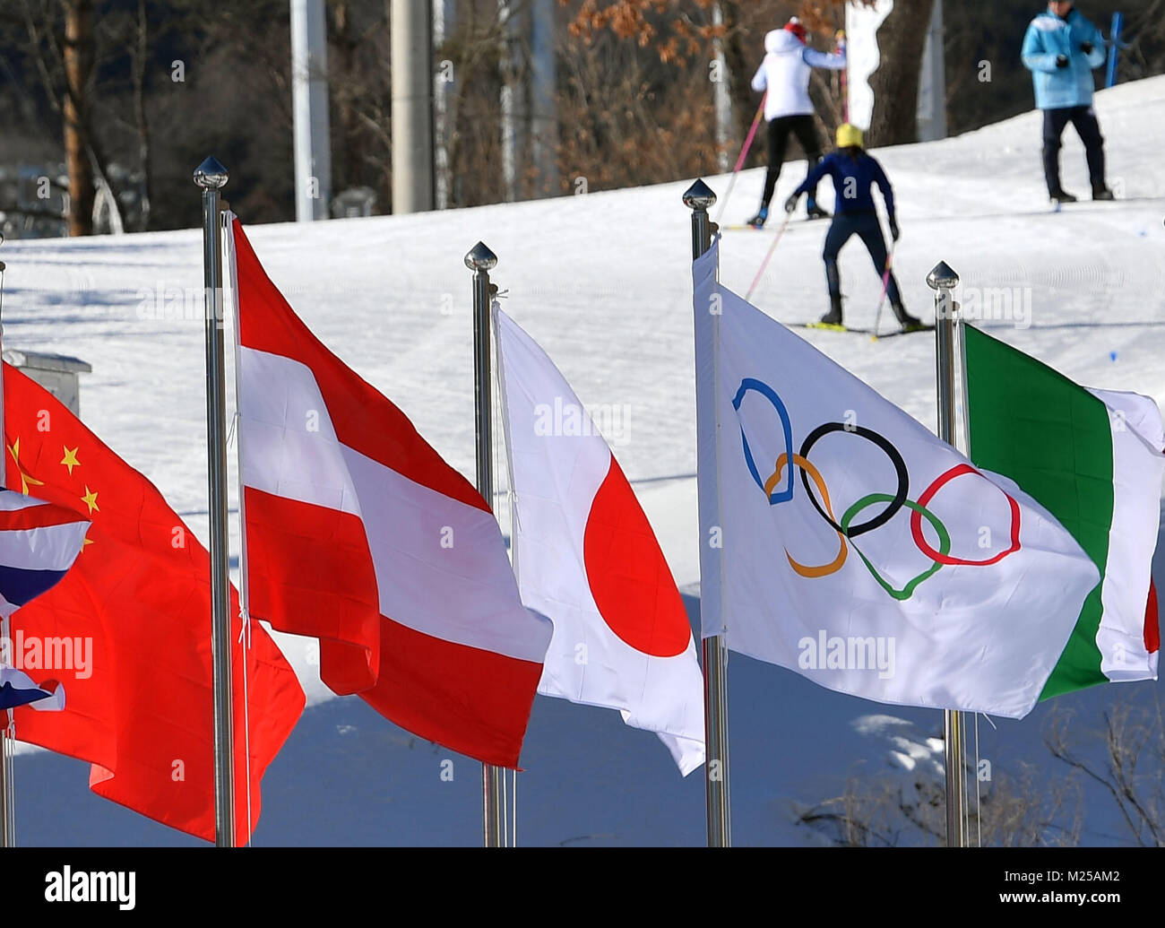 Pyeongchang, South Korea. 05th Feb, 2018. The Olympic flag and flags of ...