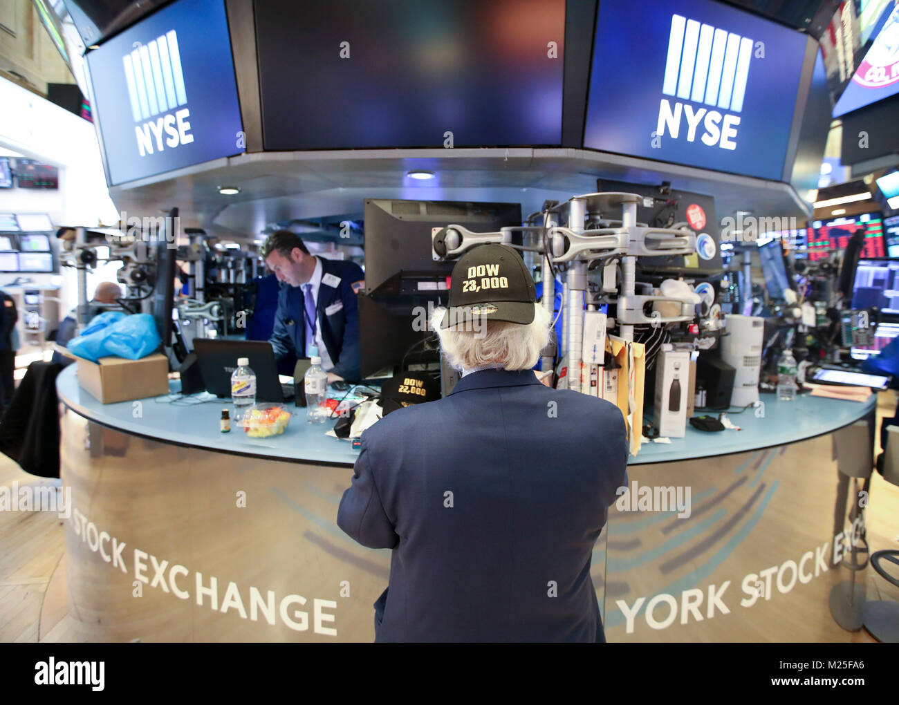 New York, USA. 5th Feb, 2018. A trader works at the New York Stock ...