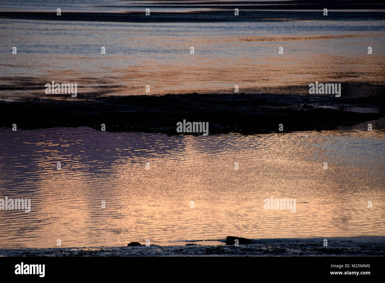 Reflection of the sky at sunset in the water Stock Photo - Alamy